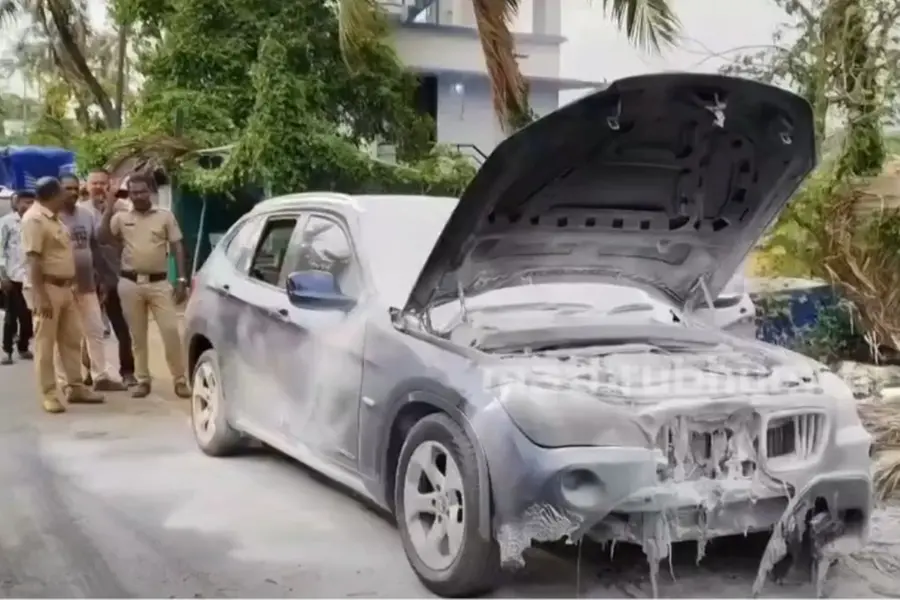 BMW catches fire midway in Kerala, owner escapes; vehicle completely ...