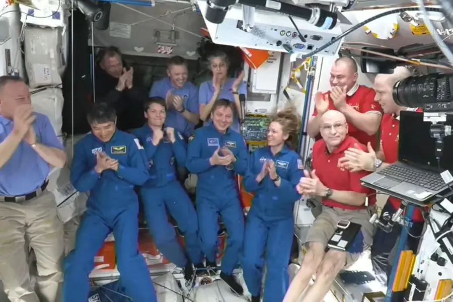 Emotional reunion in space as Crew Dragon opens hatch to ISS, handover ...