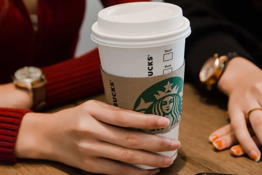 Starbucks to lay off 1,100 corporate employees globally as CEO ...