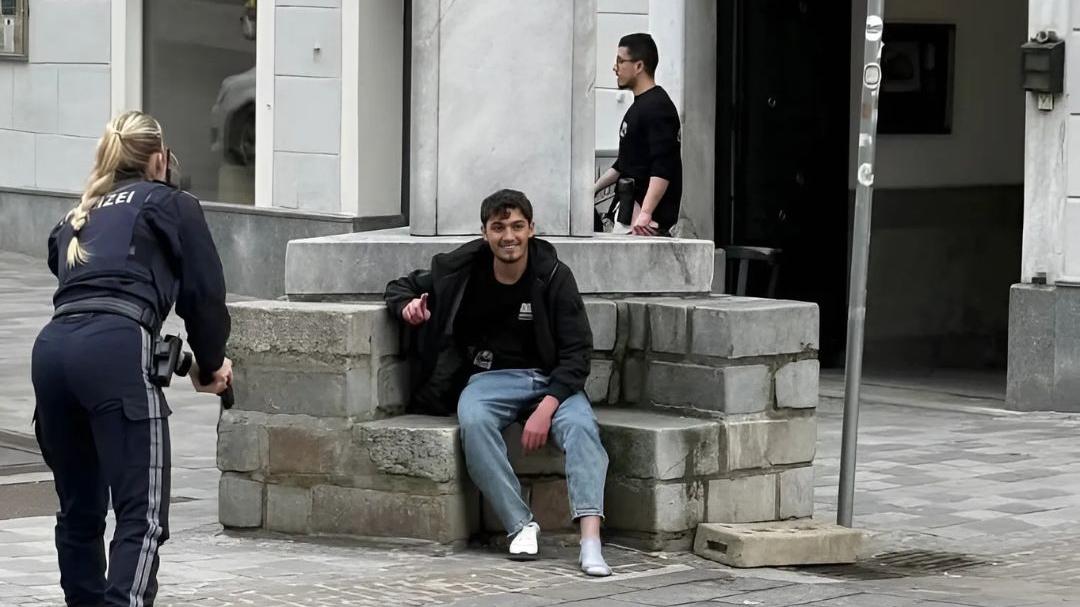 Syrian asylum seeker seen smiling during arrest after fatal knife ...