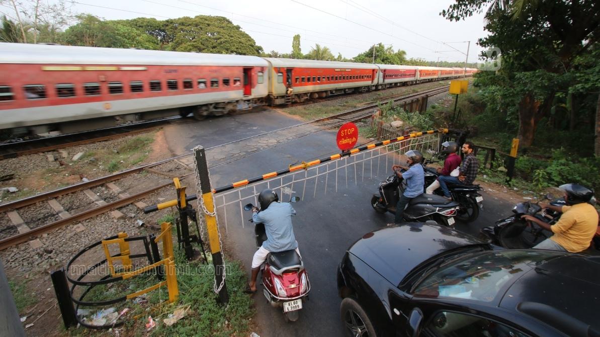 Drunken gateman fails to open railway gate; irked motorists left in ...
