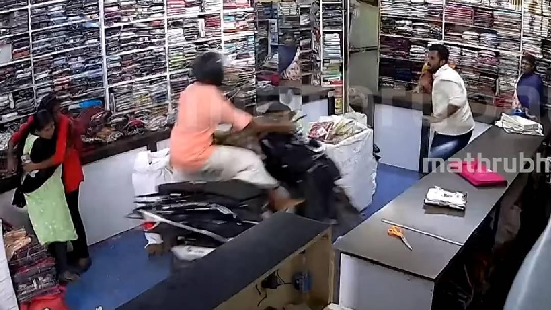 Scooter crashes into textile shop in Kerala after rider loses control ...
