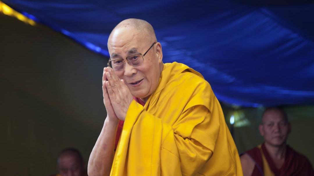 Dalai Lama apologises to boy, his family