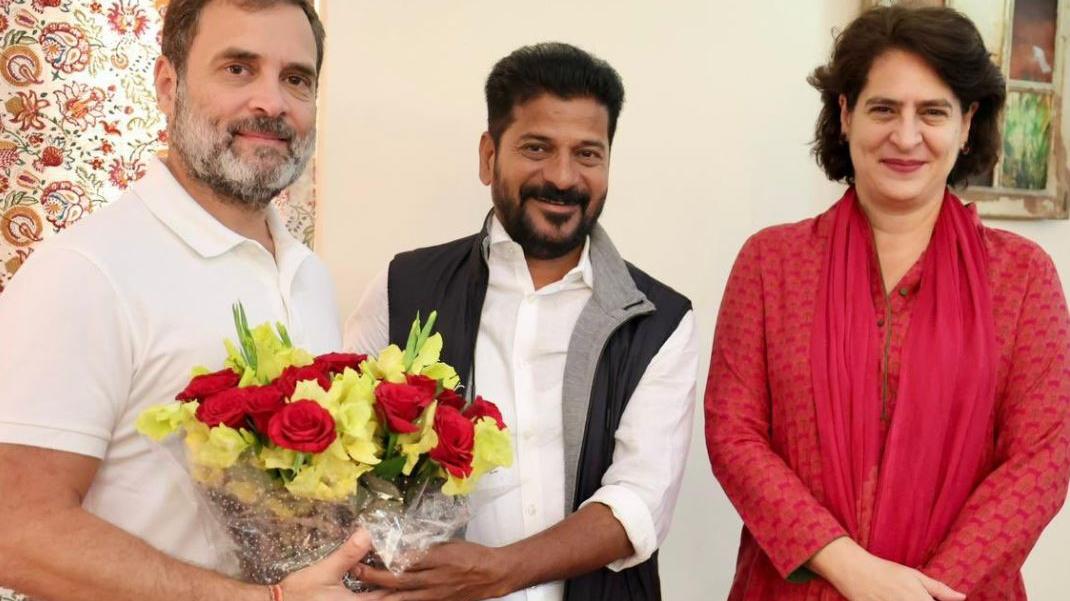 Revanth Reddy to take oath today, meets Cong high command in Delhi