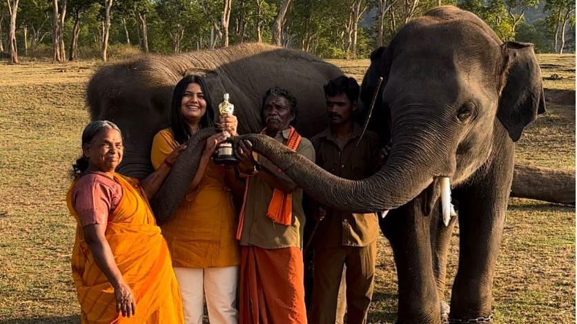 Bomman, Bellie, Bommi & Raghu of 'The Elephant Whisperers' pose with ...