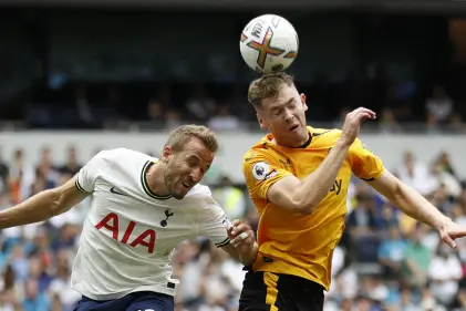Kane's landmark goal fires Spurs to victory over Wolves