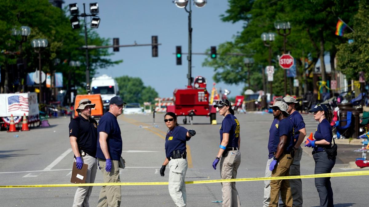 FBI searches scene of shooting that targeted July 4 parade