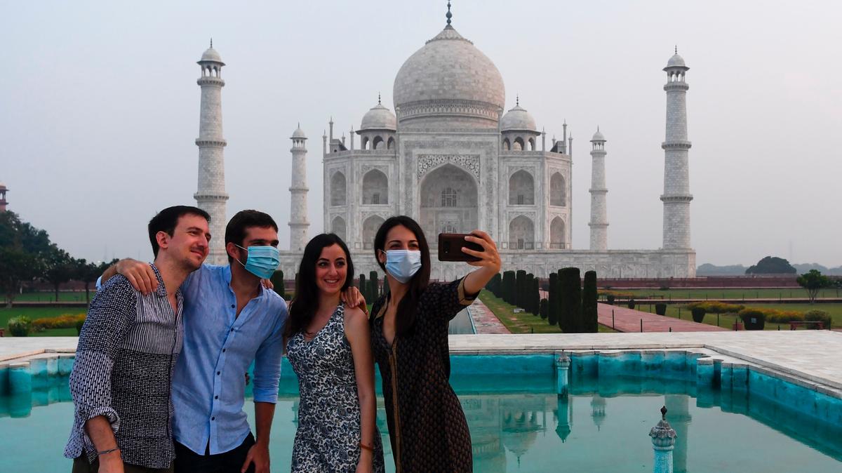As Taj reopens, photographers, business owners brim with hope after ...