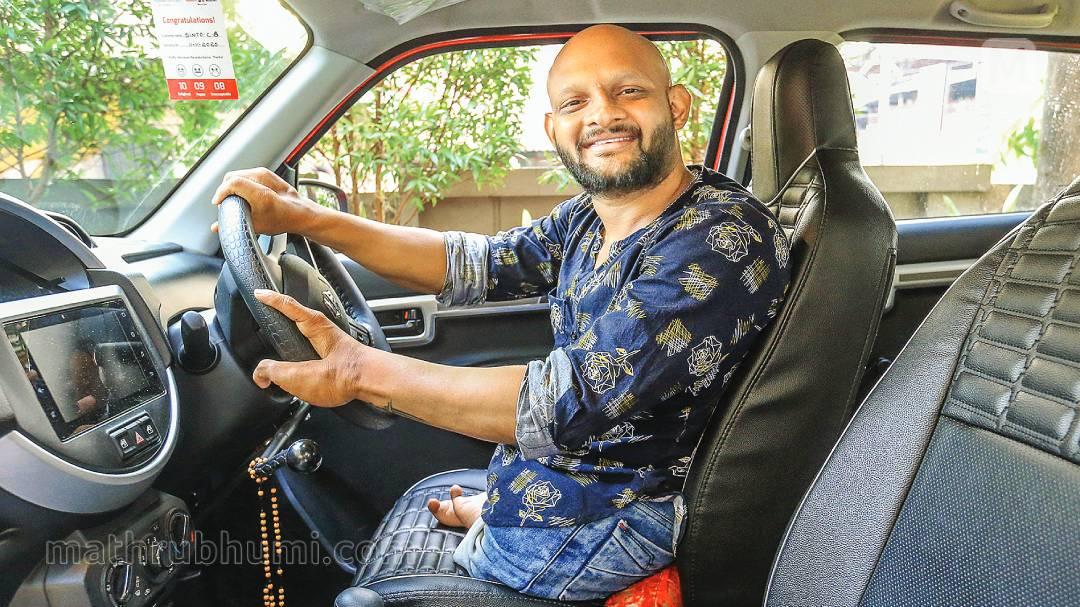 Man born without legs drives car for 116 km every day | Mathrubhumi English