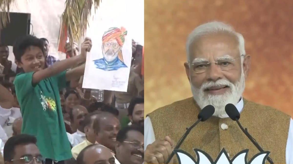 PM Modi spots young boy holding his photo at Kerala gathering: WATCH ...