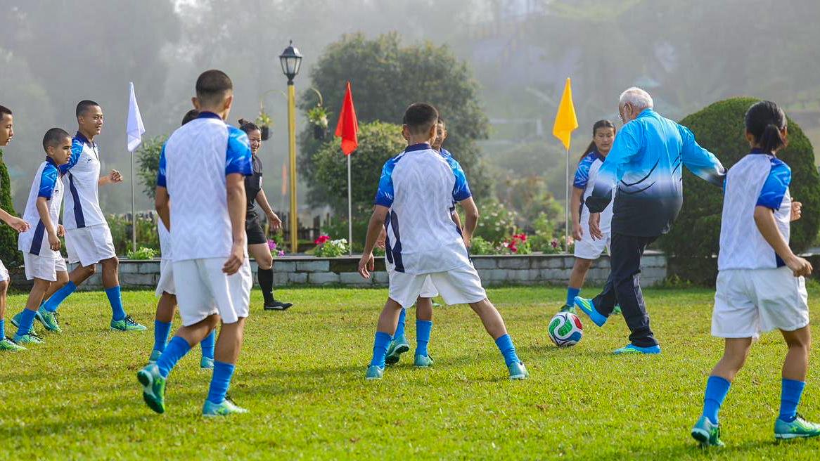 ‘PM scores a goal’: Modi plays football with children in Sikkim ...